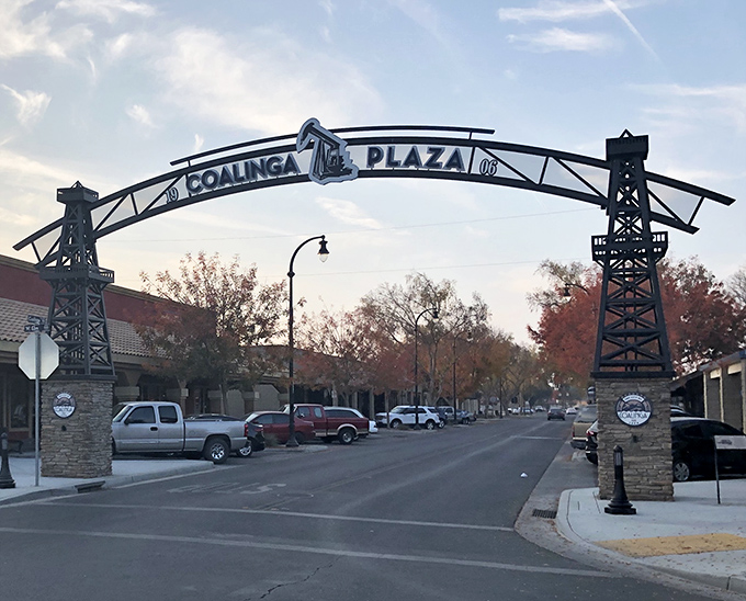 Coalinga Plaza's entrance arch pays homage to the town's oil derrick heritage, welcoming visitors to a downtown where you can still find a parking spot.