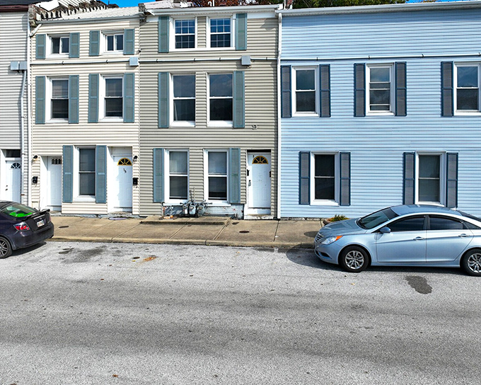 These pastel-hued townhouses aren't just homes&mdash;they're chapters in an ongoing story that's been unfolding for two centuries.