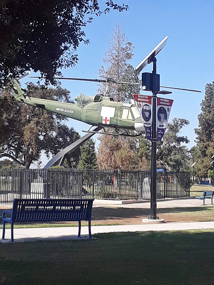 This military helicopter memorial stands as a silent tribute to service members, reminding visitors that freedom's price is paid by neighbors and friends.