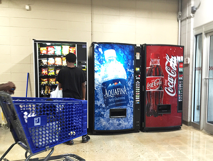 Even treasure hunters need sustenance! The vending machine oasis provides liquid courage for those about to dive back into the bargain wilderness.
