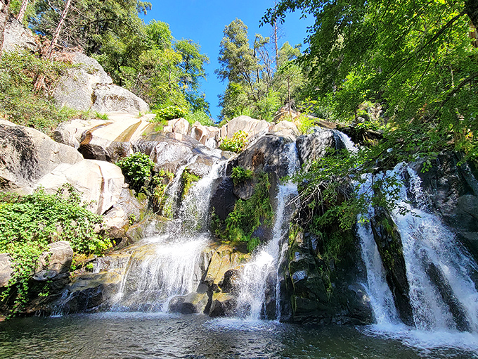 Water doesn't just fall here—it performs, cascading over ancient granite in a show that's been running longer than "The Simpsons."