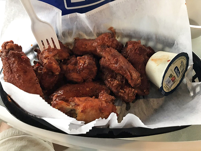 Wings that prove Old Man Frank's isn't just a one-trick pony – these crispy, sauce-slathered beauties would make Buffalo proud.