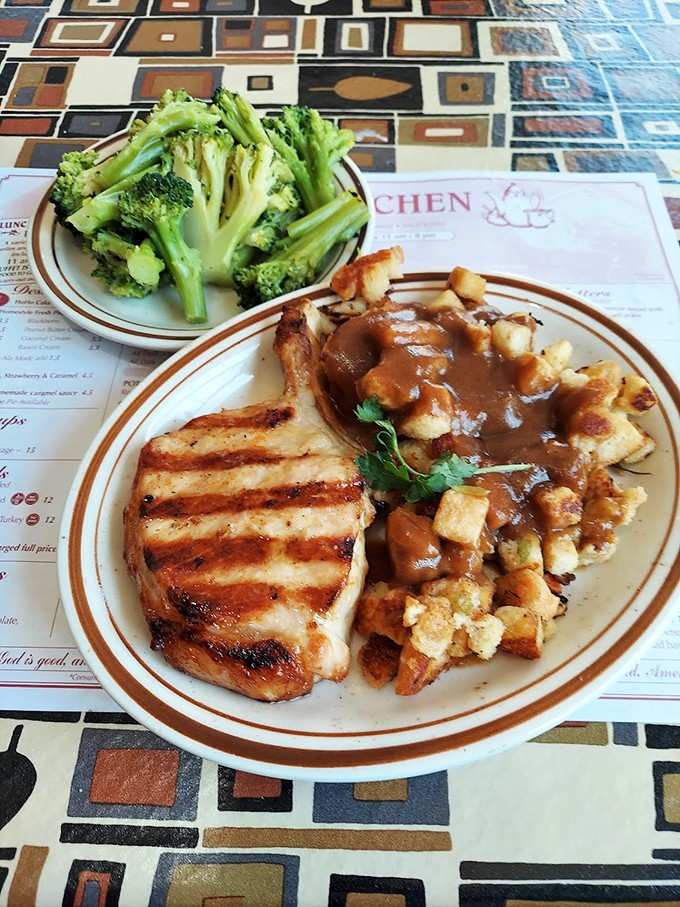 Perfectly grilled pork chop that's juicy enough to make vegetarians question their life choices, temporarily of course.