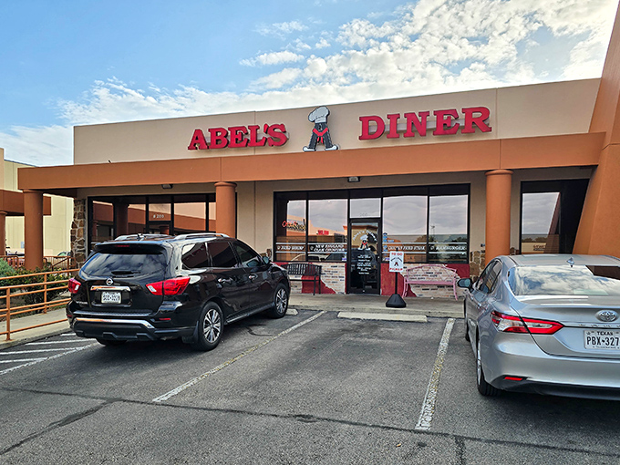 Abel's Diner's bold red sign stands out like a beacon for breakfast lovers searching for homestyle morning magic.