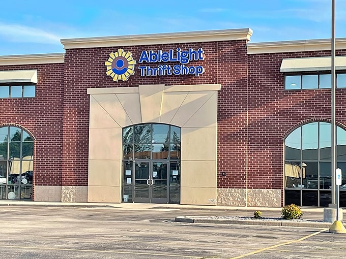 AbleLight's sunburst logo promises a bright shopping experience where every purchase illuminates someone's life.