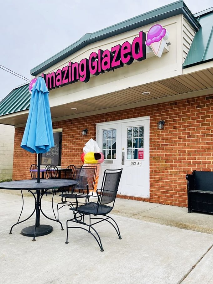 Amazing Glazed's brick fa&ccedil;ade and cheerful pink sign promise sweet adventures beyond that door. Chesapeake's most appropriately named shop!