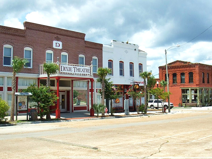 Apalachicola's Dixie Theatre stands sentinel on a street where oyster shuckers are local celebrities. Broadway may have more shows, but does it have better seafood?