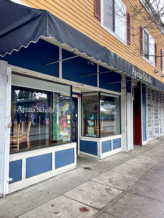 Apizza Scholls keeps it simple outside because they're saving all the drama for what happens in their legendary ovens.