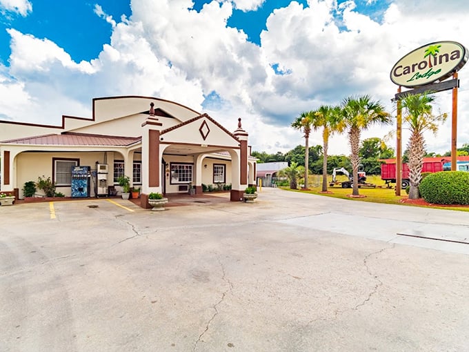 The Carolina Inn sign beckons like an old friend inviting you to stay awhile and save money.