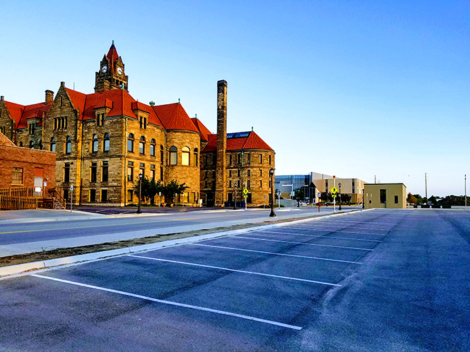 This historic building with striking red rooftops and a towering clock creates a timeless backdrop for Bay City&rsquo;s downtown charm.