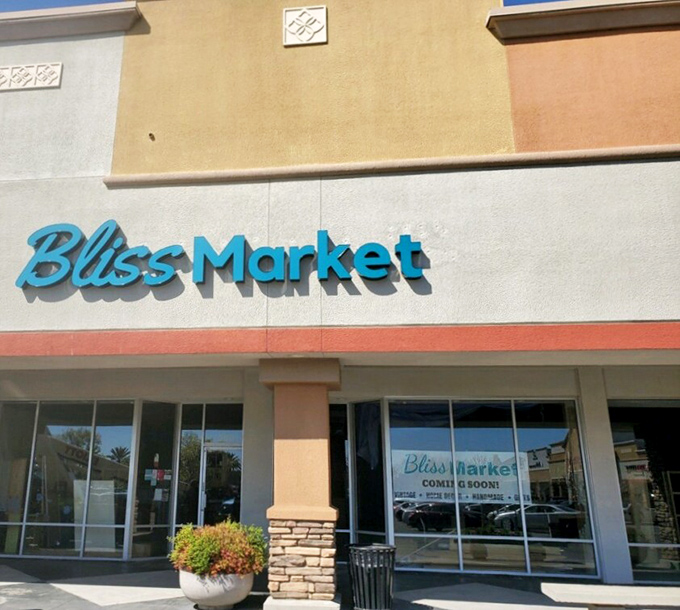Bliss Market's cheerful blue sign promises exactly what it delivers&mdash;shopping bliss. This Roseville gem elevates thrifting to an art form.