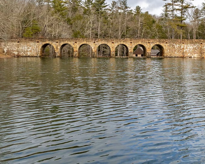 This ancient stone bridge emerges from placid waters near Crossville, a haunting reminder of Tennessee's long and winding history.