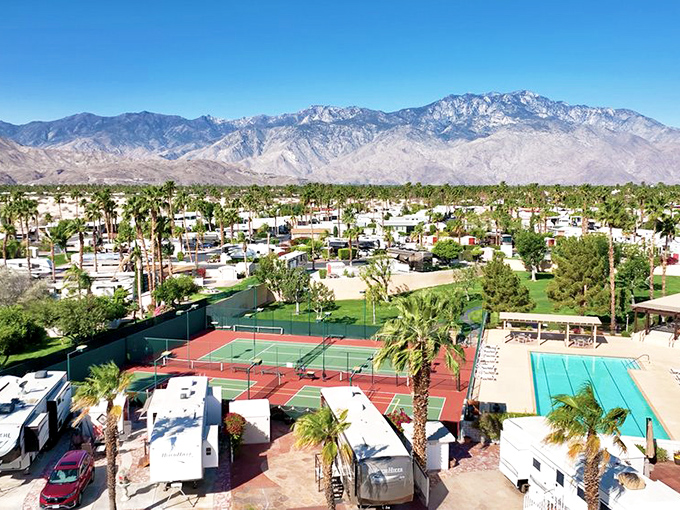 Desert Shadows from above&mdash;tennis courts, pools, and mountains that don't care what you paid for your home.