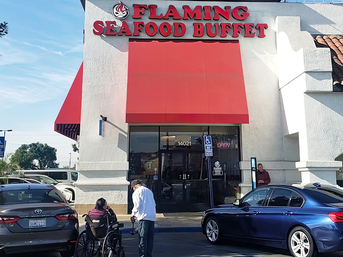 That bold red awning isn’t just for show—it’s advertising the heat level of their most popular dishes!