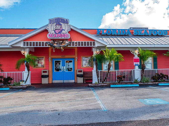 Florida's Seafood Bar & Grill wears its coral-colored charm like a badge of honor. That vibrant exterior is just a preview of the flavor explosion waiting inside. 
