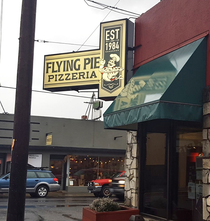 Flying Pie's vintage sign has been Portland's bat signal for pizza emergencies since 1984. The chef knows his dough.