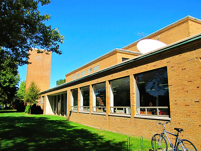 Goshen's community buildings blend brick and glass in a town where your retirement check covers more than just the basics.