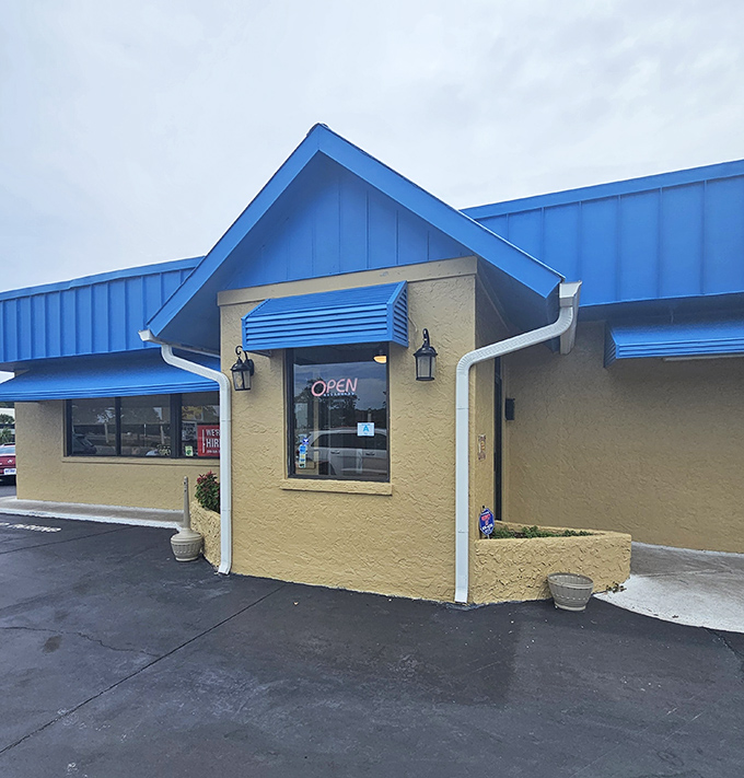 Harry's sunny yellow walls and bright blue roof mirror the perfect breakfast equation: sunny-side-up eggs and blueberry pancakes.