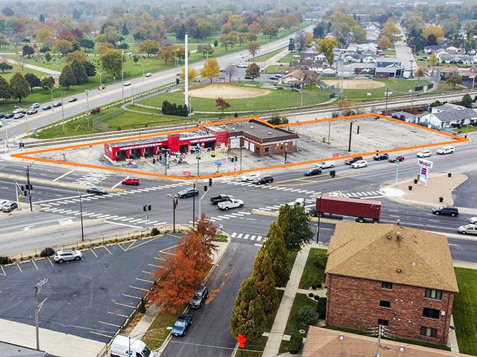 Hometown's aerial view reveals neat rows of ranch homes where American dreams thrive at reasonable prices.