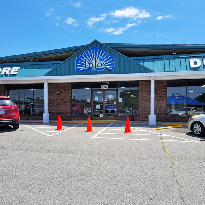 InJoy's welcoming storefront radiates positive vibes. Those traffic cones can't keep bargain hunters from their appointed rounds!