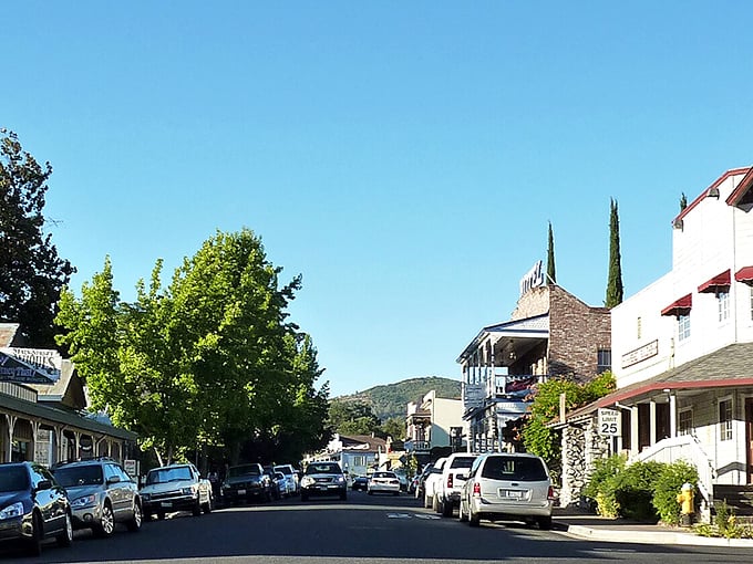The welcoming main street of Jamestown with cars parked perfectly on the sides of the road.