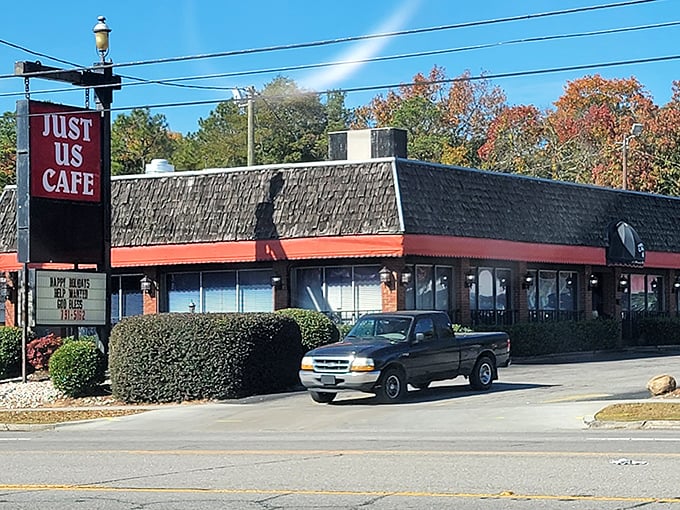 Just Us Cafe's simple red sign and classic diner profile says "no frills, just good food" &ndash; exactly what we're looking for!