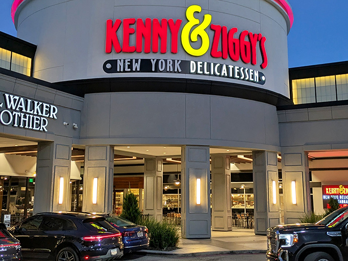 Kenny & Ziggy's curved facade glows like a beacon of New York deli authenticity in the heart of Houston.