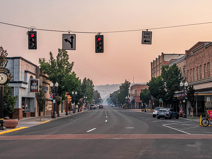 Muted pastels and vintage storefronts—like stepping into a sepia photograph that still smells of fresh paint.