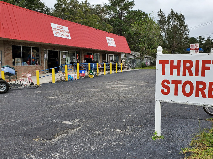 Mike's red-roofed haven beckons bargain hunters—where furniture dreams come true without the nightmare prices.