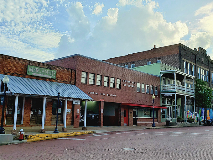 Nacogdoches' historic buildings stand shoulder to shoulder, creating a downtown skyline that's pure small-town Texas perfection.