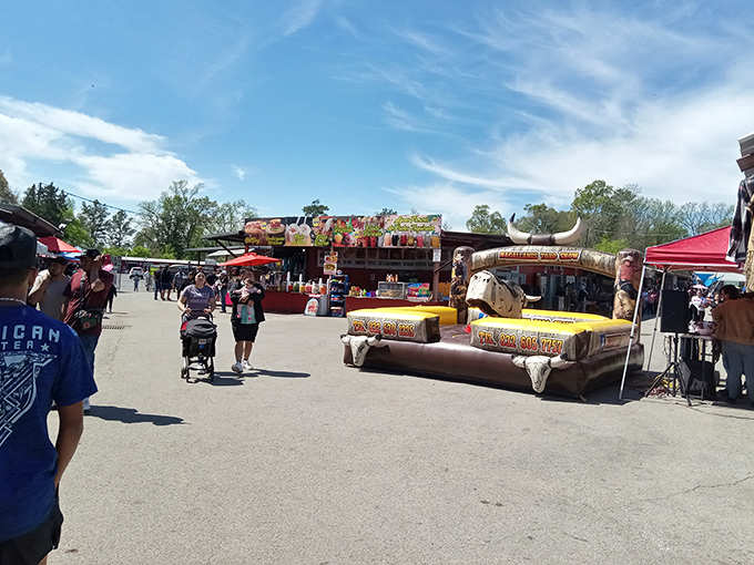 Nothing says "Texas flea market" like a giant longhorn skull display under blue skies—where shopping meets roadside attraction.