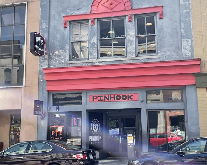 Pie Pushers' blue building with bold red trim stands out like their creative pizza combinations.