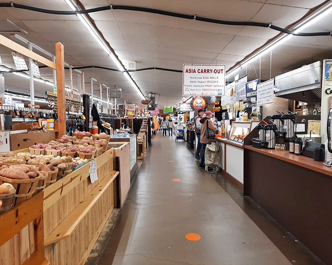 Farm-fresh paradise! Roots Market's produce section bursts with colorful fruits and vegetables that put grocery store offerings to shame.