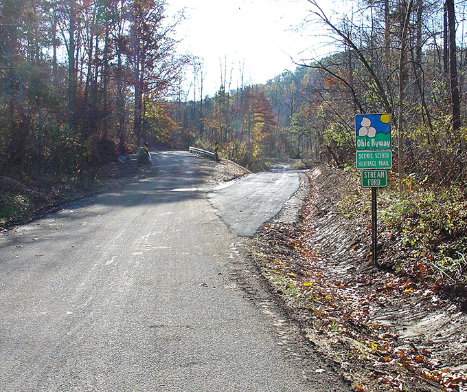 The Scioto Heritage Trail's autumn splendor creates a natural cathedral of gold and crimson, perfect for Sunday drives.