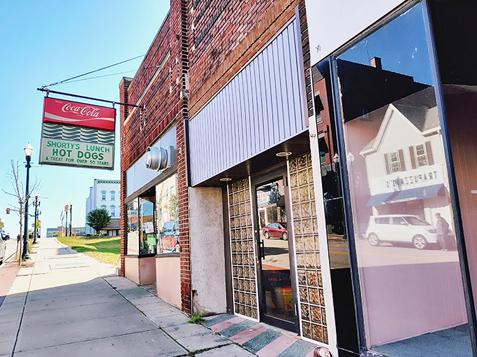 Shorty's Lunch might look unassuming, but that vintage Coca-Cola sign marks the spot where hot dog dreams come true.