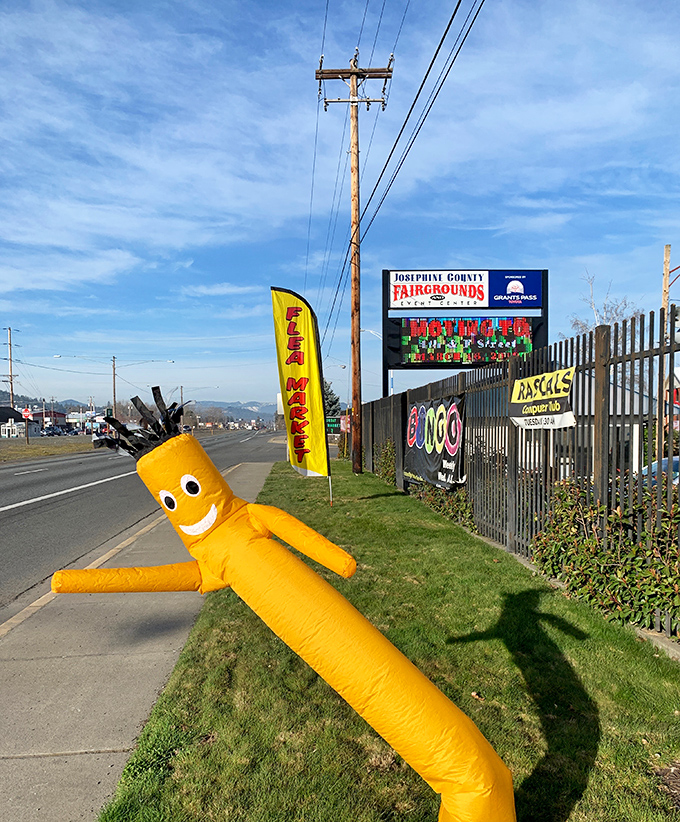 Nothing says "flea market fun ahead" like a waving inflatable tube man guarding the entrance to treasure-hunting paradise in Grants Pass!