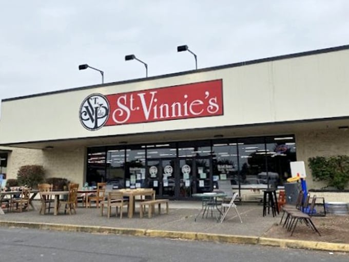 St. Vinnie's bold signage stands out against the Eugene sky. Where furniture finds new homes and vintage treasures await their next chapter.