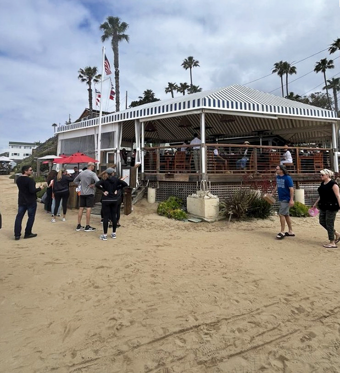 Step back in time at this historic beach cottage restaurant. That striped awning has sheltered generations of happy diners.