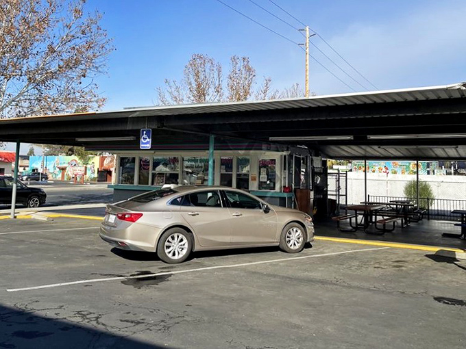 Classic covered parking creates the perfect stage for drive-in theater dining at its absolute finest.