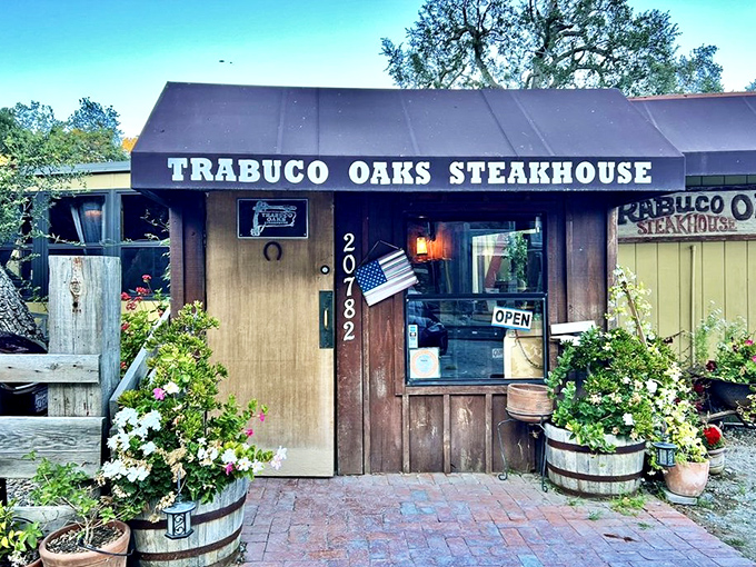 Tucked among flowering gardens, this canyon hideaway looks like a secret worth discovering for exceptional steaks and peaceful dining.