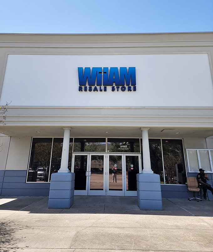 By day or night, WHAM Resale Store's clean lines and welcoming entrance invite serious thrifters to explore within.
