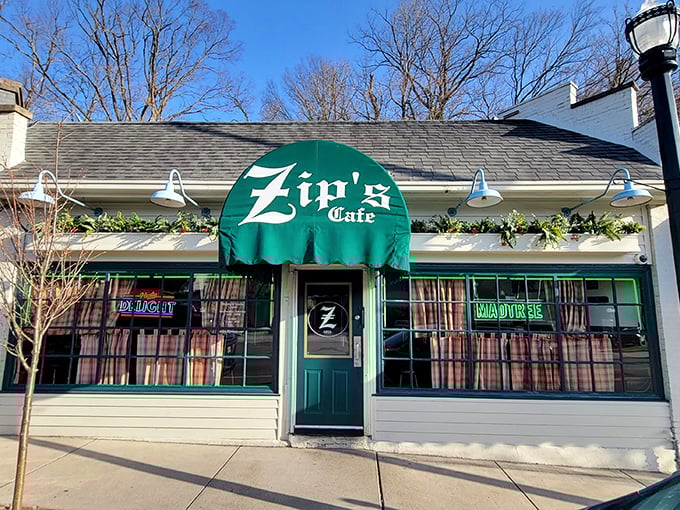 Zip's green awning signals burger paradise ahead. This Cincinnati institution has been keeping it real while keeping bellies happy.