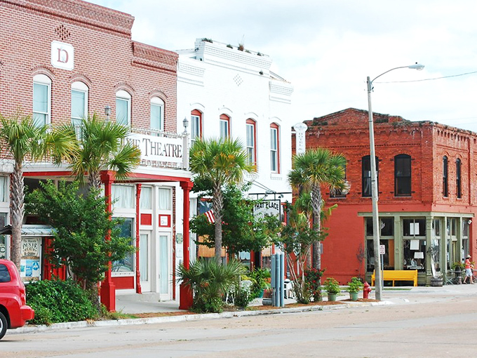 The red brick heart of Apalachicola beats with maritime history. These buildings have witnessed more fish stories than a tackle shop on Saturday morning.