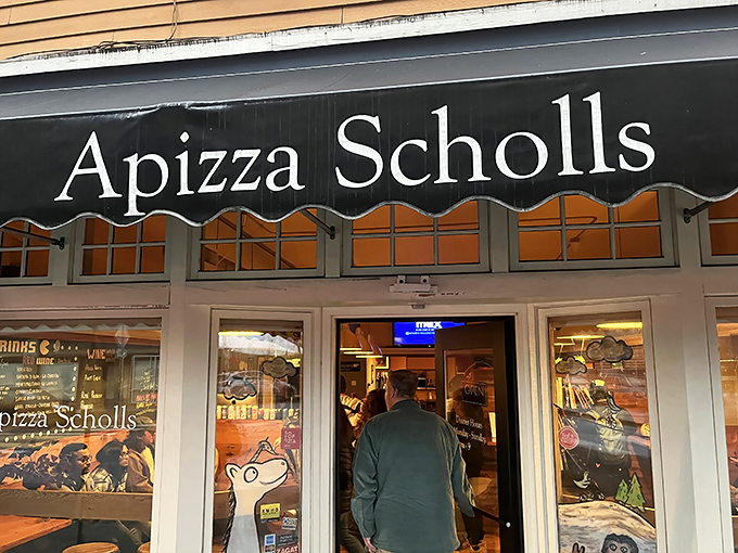 The blue awning might be understated, but what comes out of those ovens has food writers running out of superlatives.