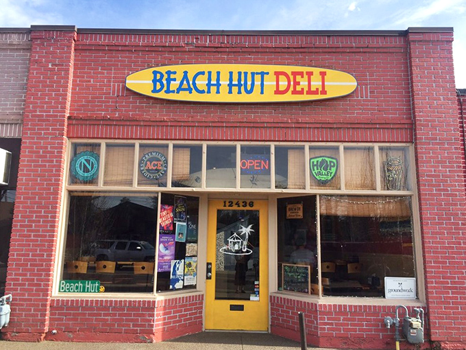 The bright yellow door welcomes sandwich lovers like the sun greeting the ocean. Beach vacation vibes included at no extra charge.