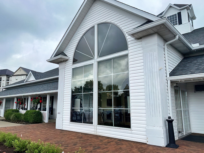 The impressive entrance with its soaring windows reflects the scale of flavor waiting for you inside this Amish country gem.