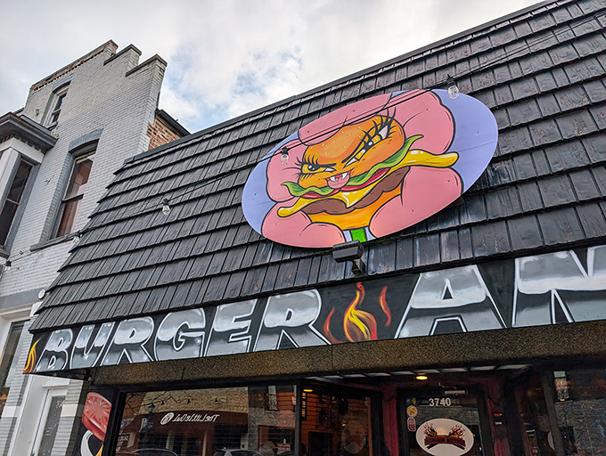 That sassy burger logo winks at passersby, daring them to try combinations that shouldn't work but absolutely do.