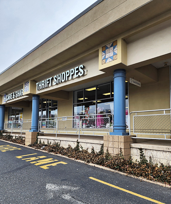 Architectural details make Care & Share stand out from ordinary thrift stores. Those blue columns frame an entrance to affordable treasures.