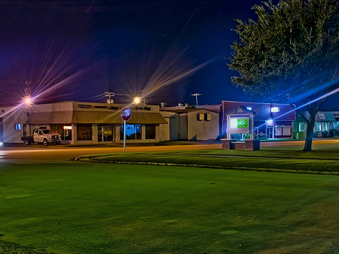 At night, the town glows softly—like a jukebox on shuffle, spinning stories under a velvet sky.