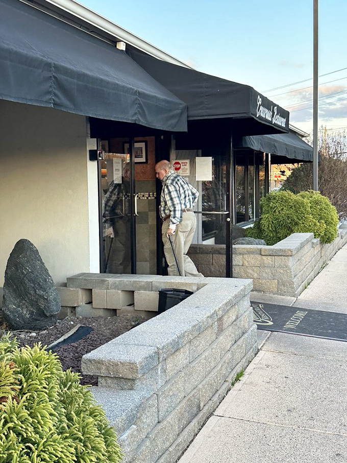 Stone accents and professional signage hint at elevated dining without losing burger soul. 